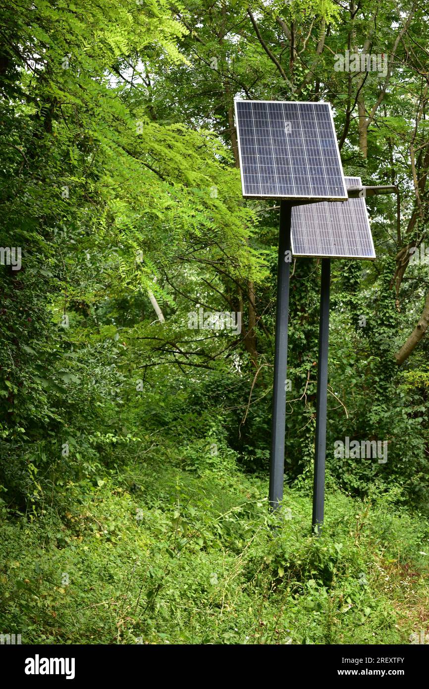 Solar panels in the park. Small solar panels for lightning in the ...