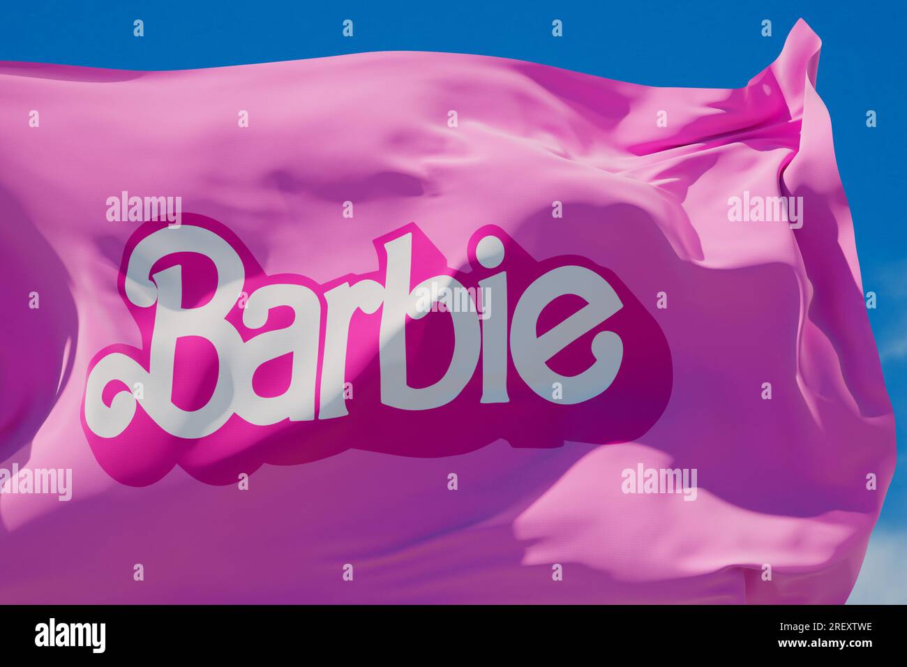 LONDON, UK - July 2023: Barbie doll logo on a flag. Barbie is a fashion ...