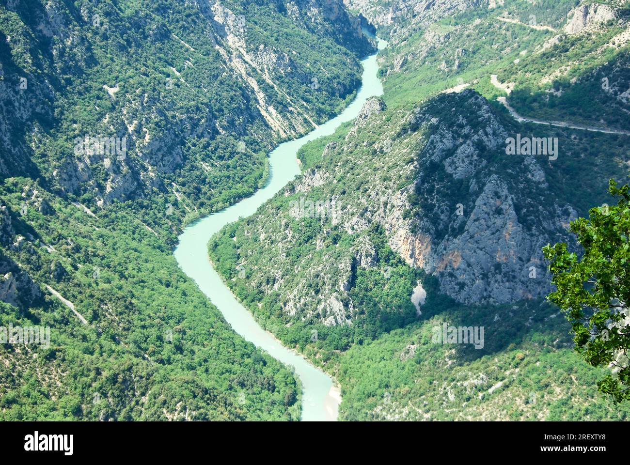View over a mountainous landscape with high pikes and stony slopes down ...
