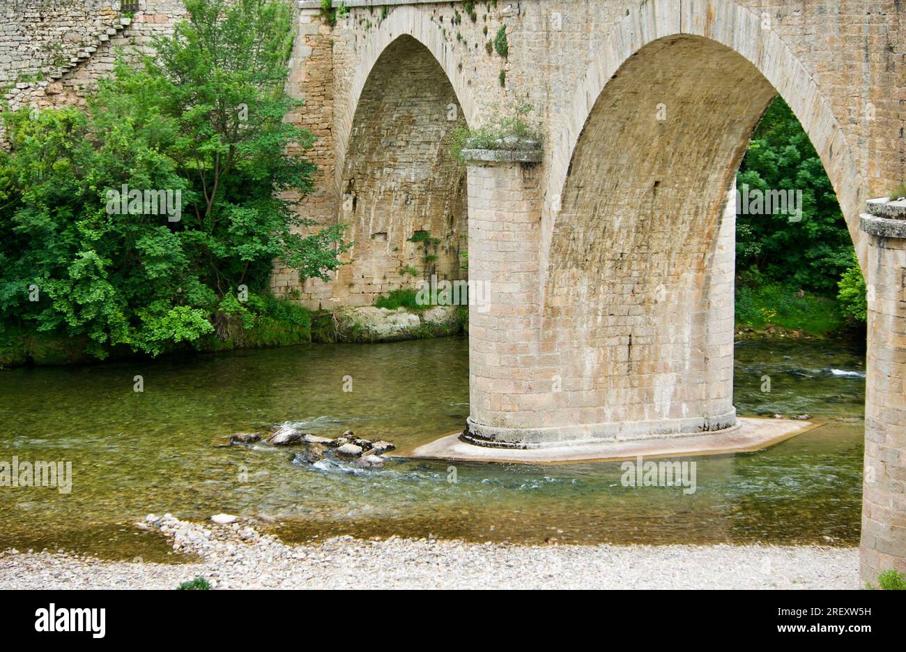 Old stone bridge arches of Le pont de La Malène over Tarn river in ...