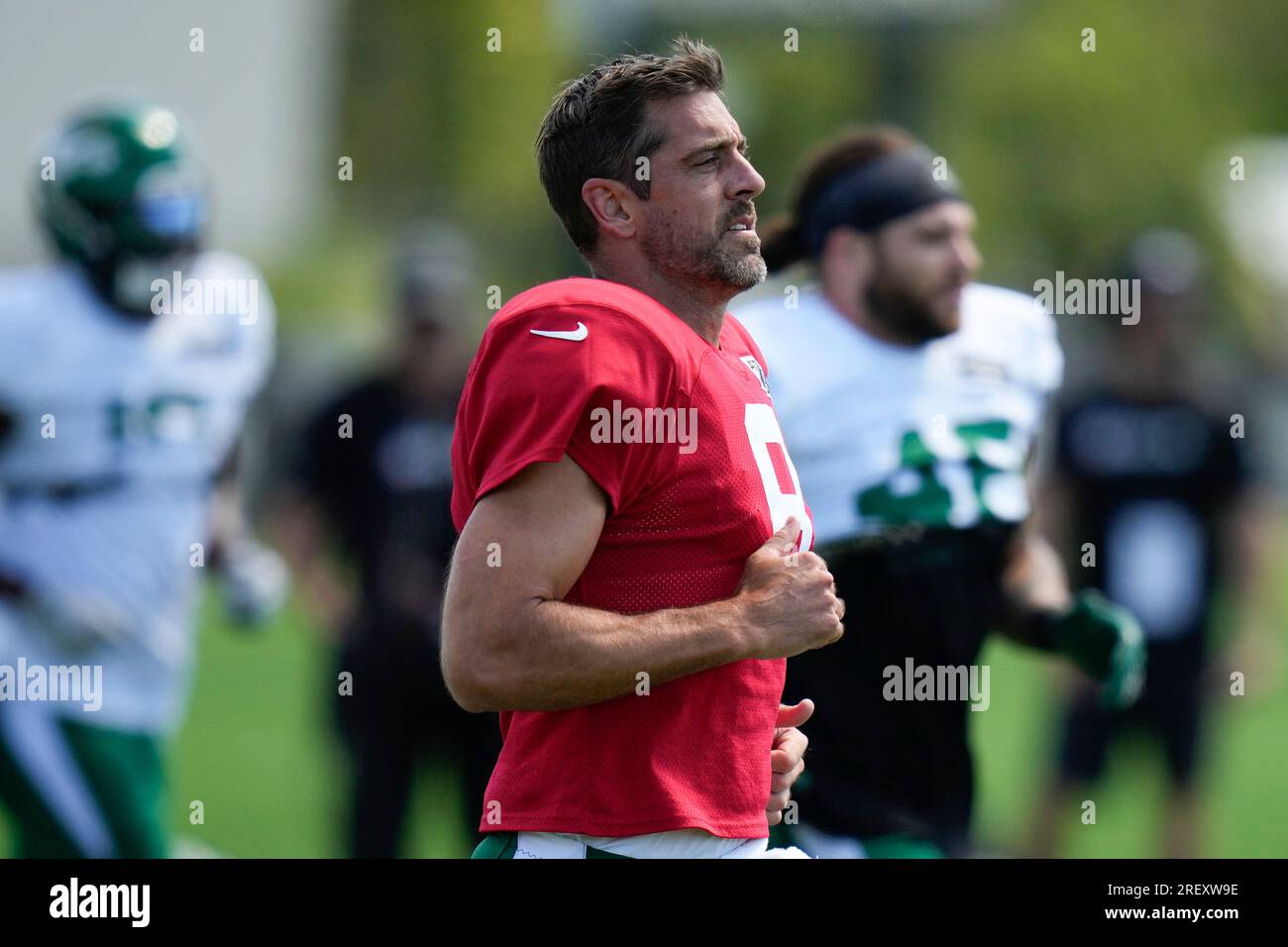 New York Jets quarterback Aaron Rodgers warms up during a practice at ...