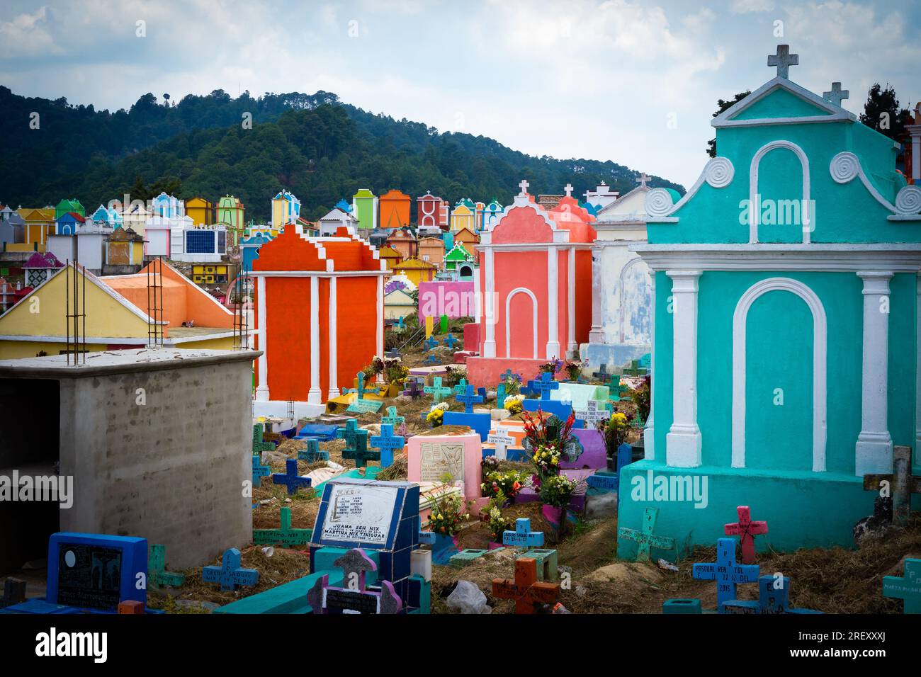 Chichicastenago, Guatemala- May 21, 2023: Colorful tombs in a row on ...