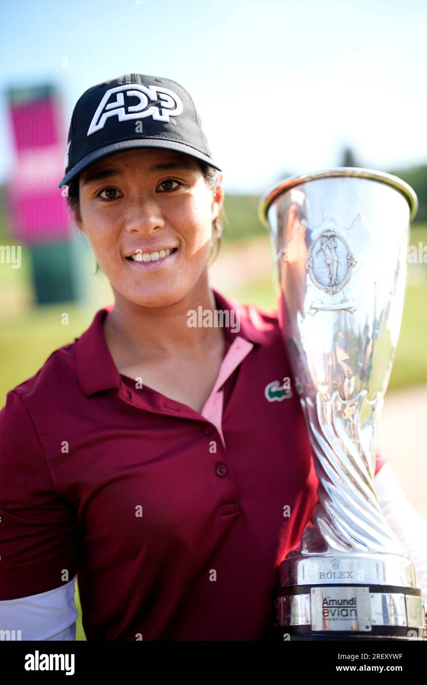 France's Celine Boutier poses with her trophy after winning the Evian ...