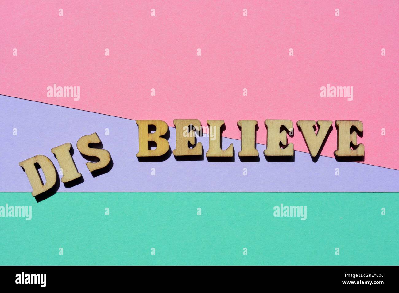 Believe, Disbelieve, words with opposite meanings in wooden alphabet ...