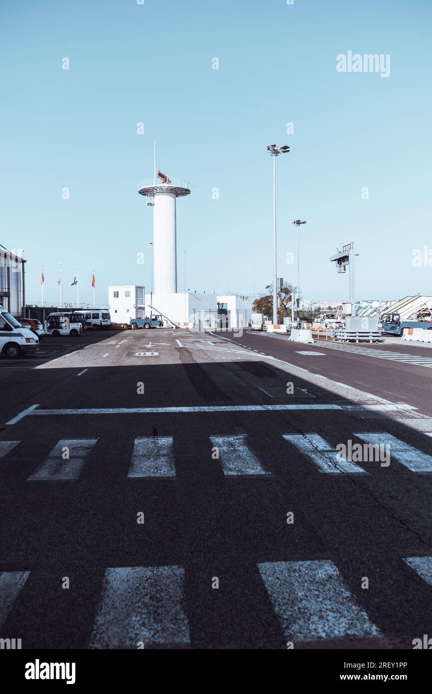 Vertical shot of an outdoor airport area with a VOR (VHF ...