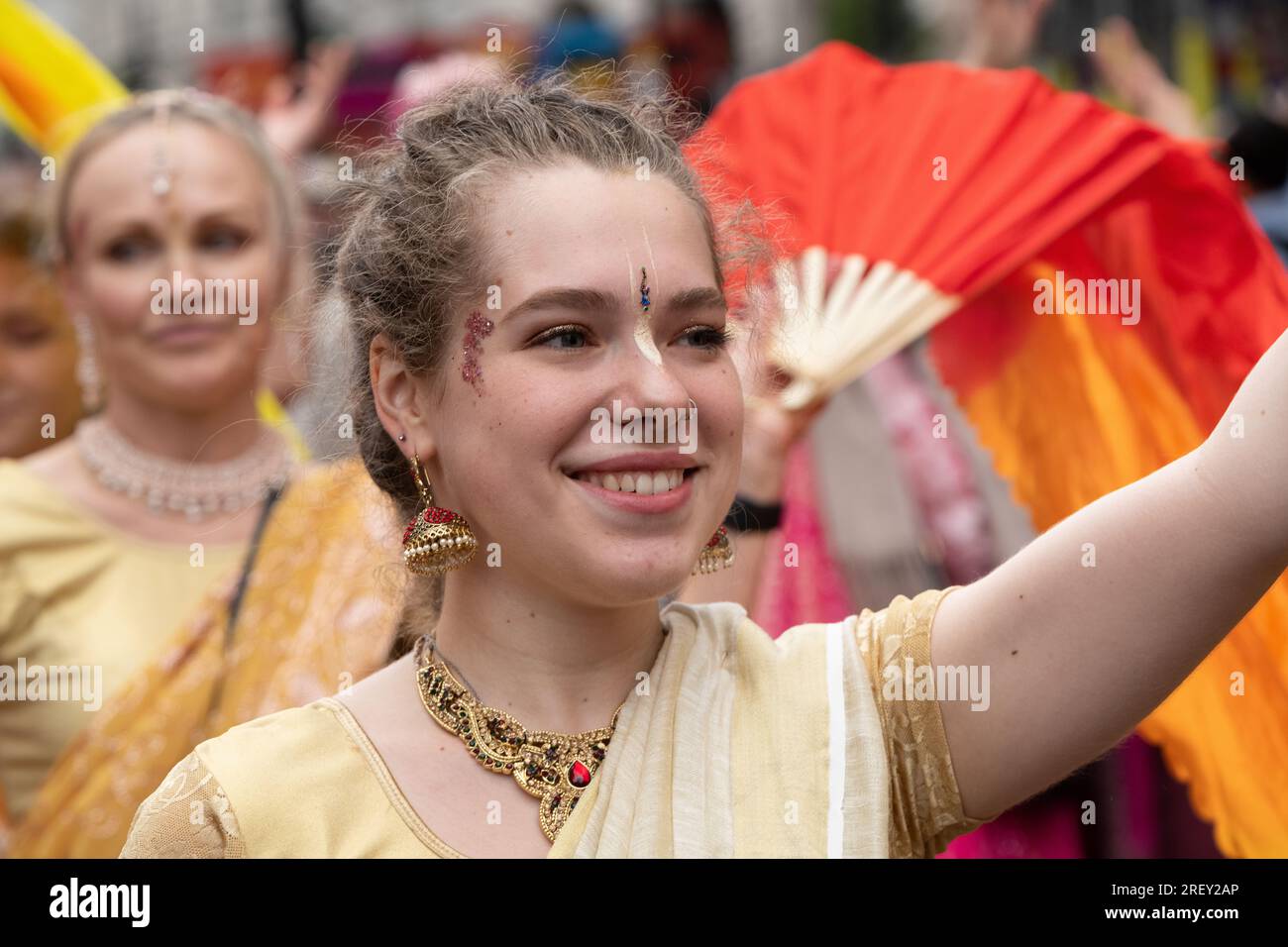 London, UK. 30 July, 2023. A dancer performs as thousands of Hare ...