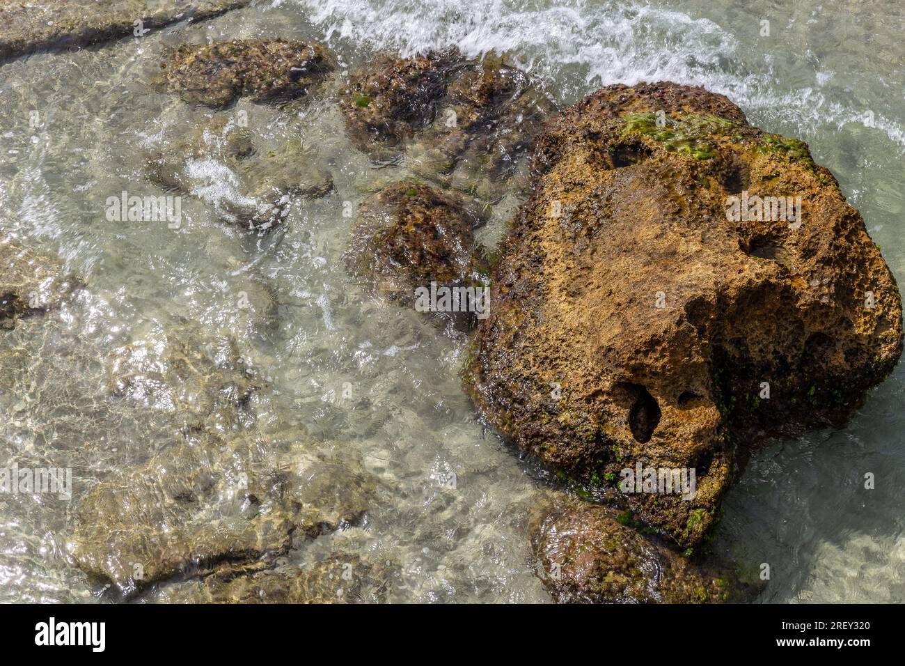 the rock and the transparent Mediterranean sea of Sicily Stock Photo ...