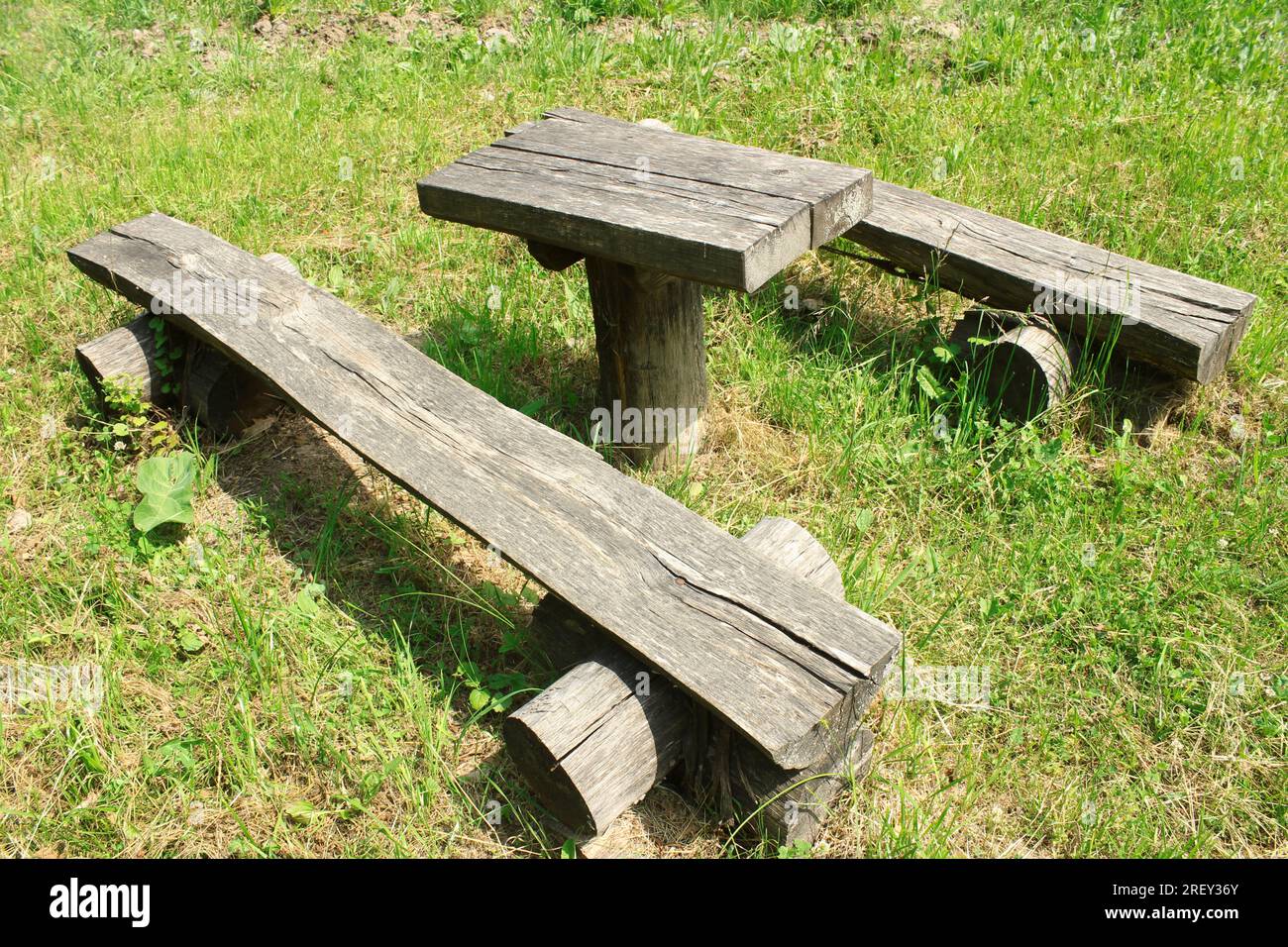 Log benches and table in nature for picnic Stock Photo - Alamy