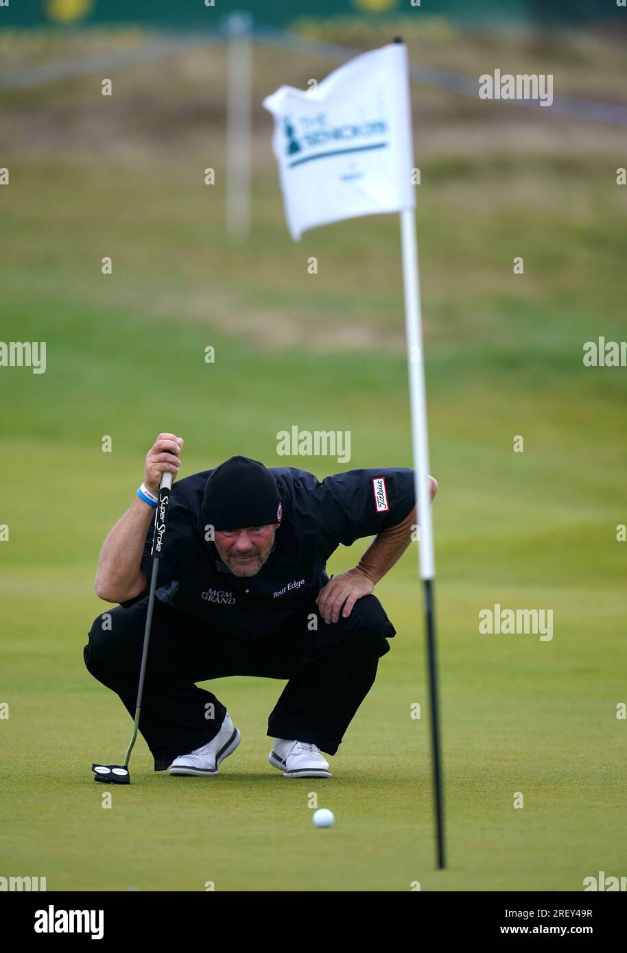 Alex Cejka lines up a putt on the fourteenth green during day four of ...