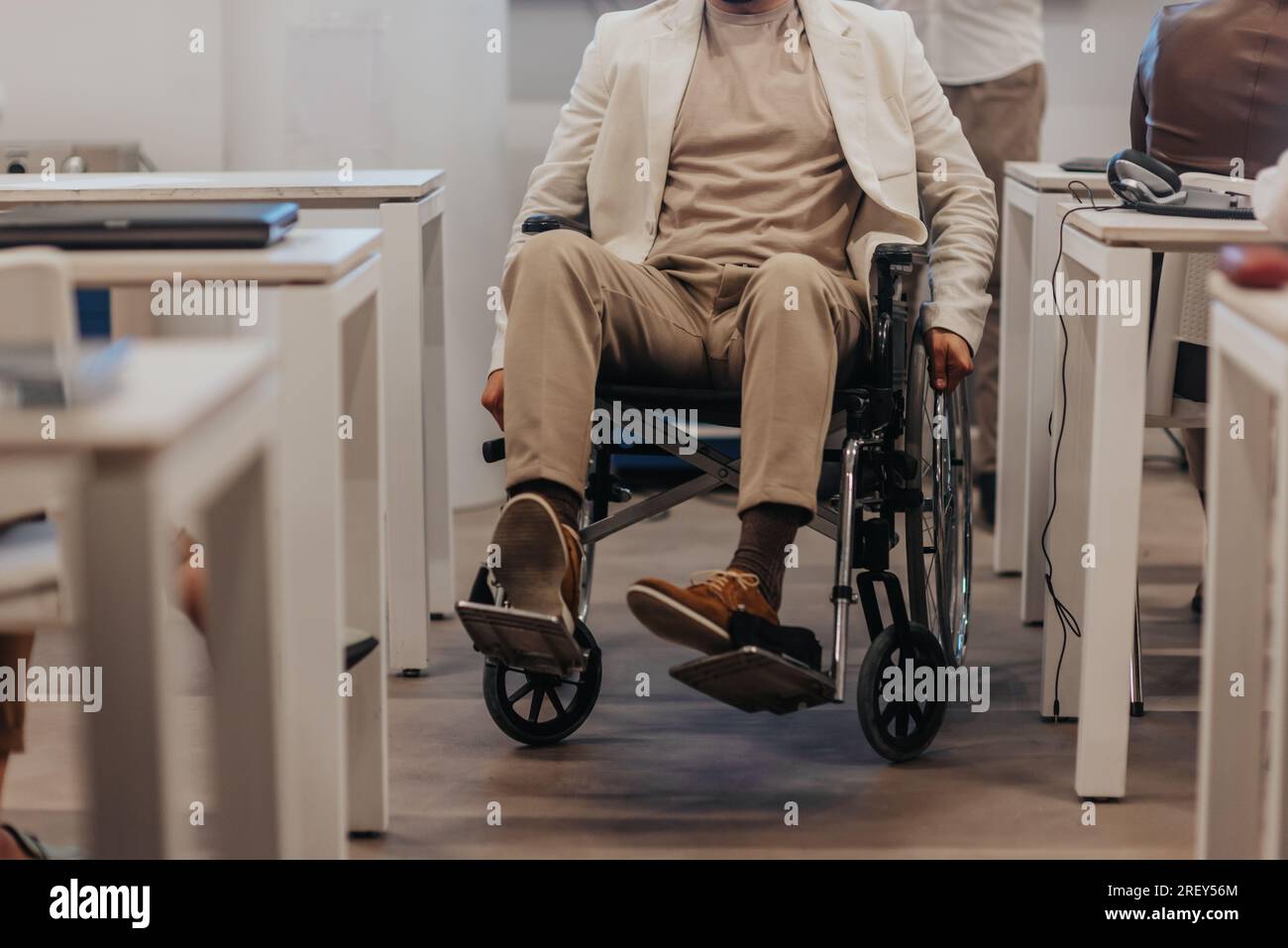 Disabled man in wheelchair. Handicapped male employee. Disabled man ...