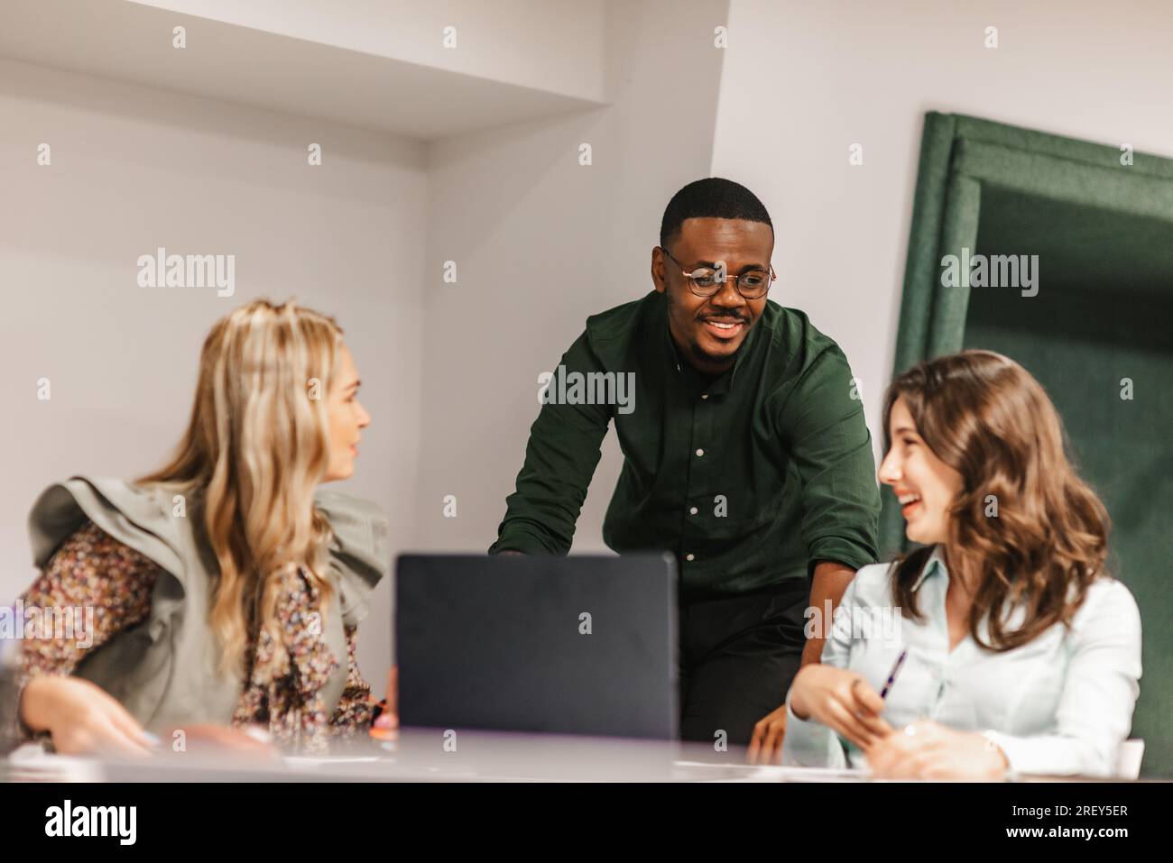 Joked with colleague hi-res stock photography and images - Alamy