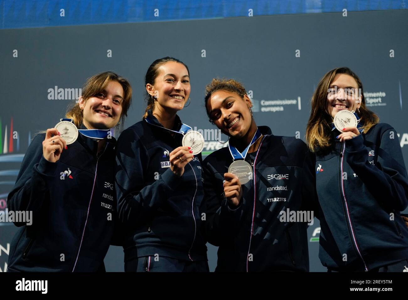 France's team members show their silver medals for the women's Team ...
