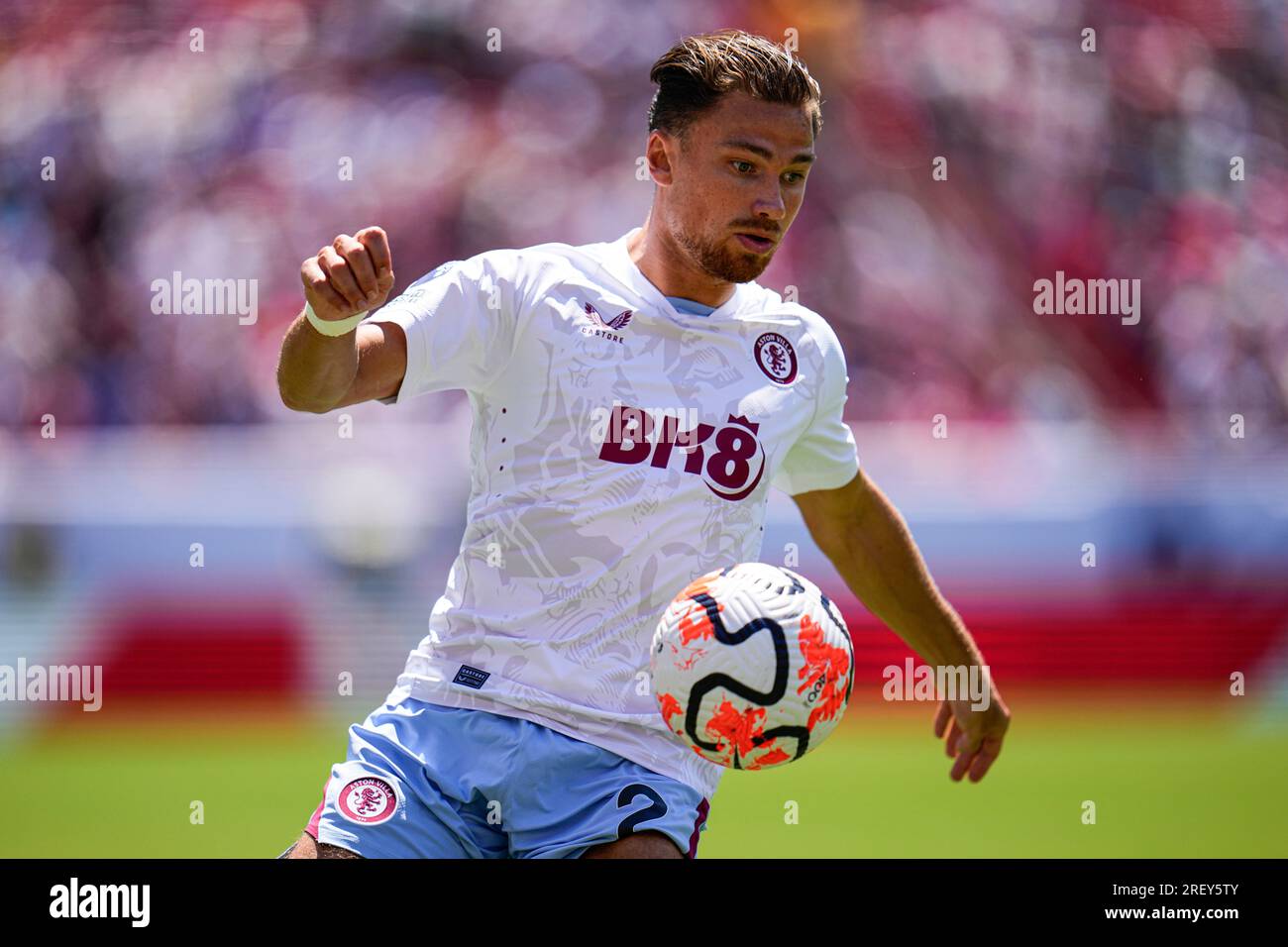 Aston Villa FC's Matty Cash controls the ball against Brentford FC during a Premier League ...