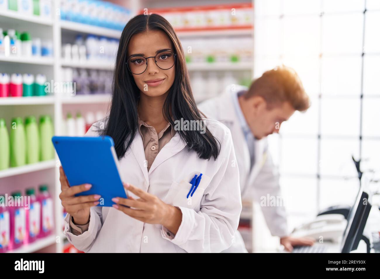 Two pharmacists using tablet hi-res stock photography and images - Alamy