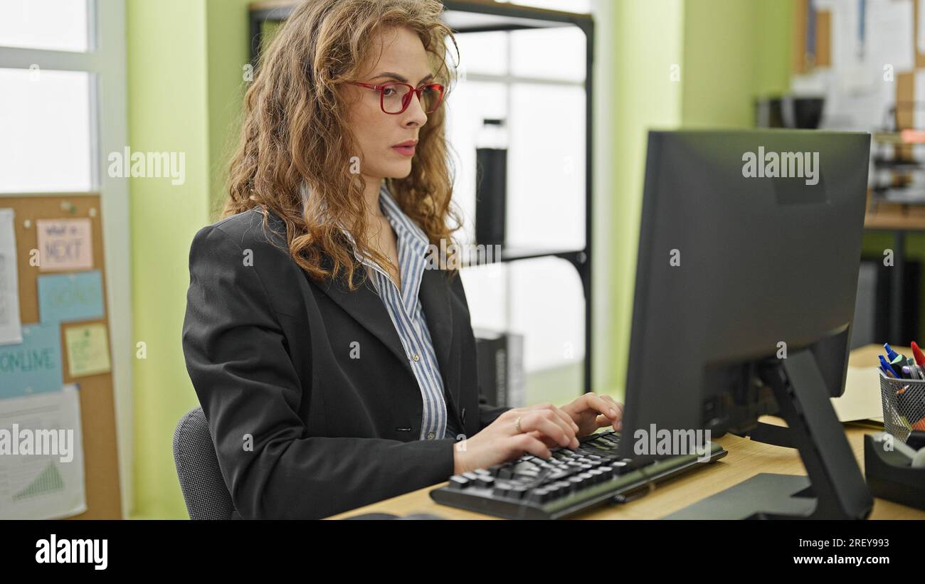Young woman business worker using computer at the office Stock Photo ...