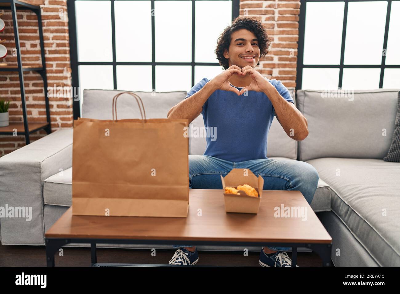 Buffalo wings eating hands hi-res stock photography and images - Alamy