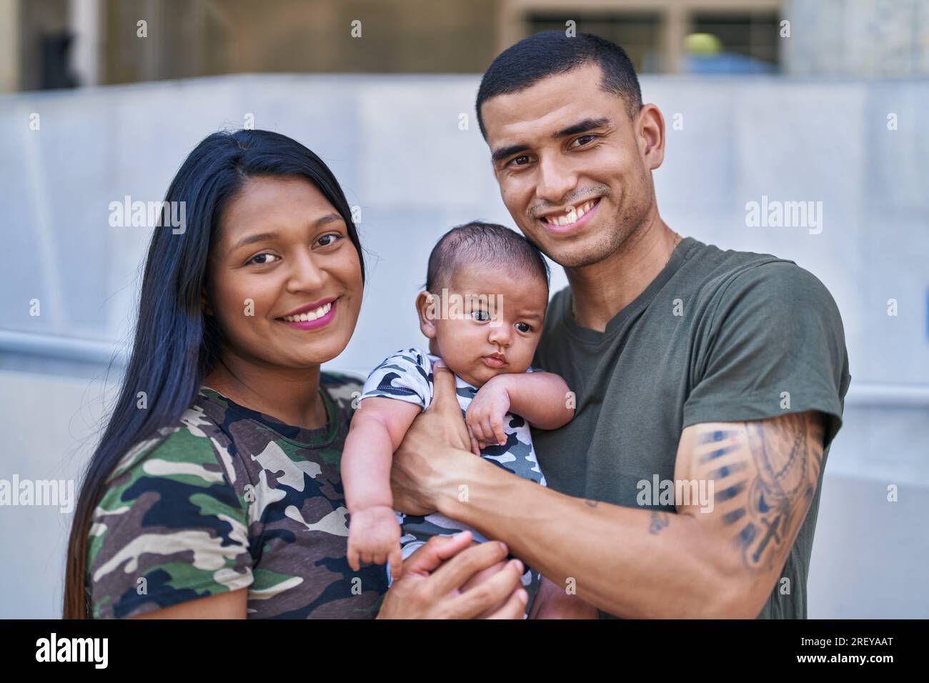 Hispanic family smiling confident hugging each other at street Stock ...