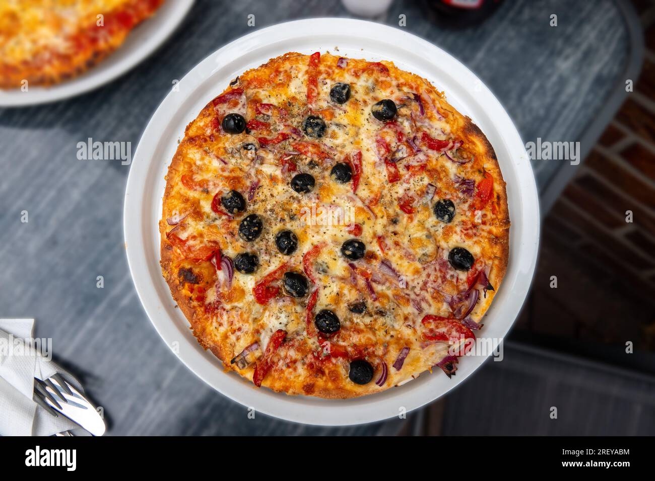 Black olive pizza Stock Photo - Alamy
