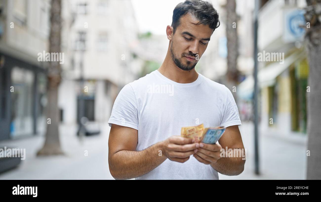 Hispanic man counting mexican hi-res stock photography and images - Alamy
