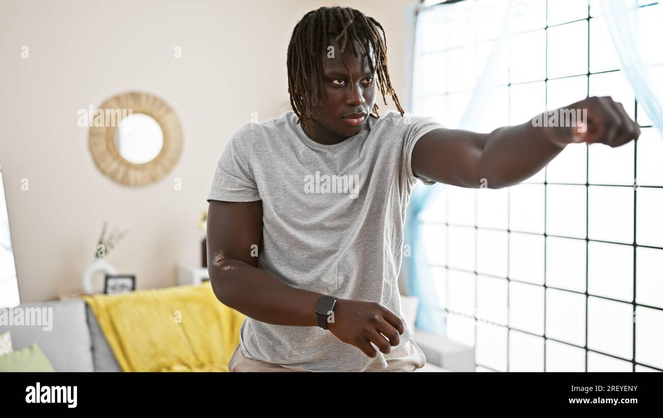 Man boxing at home hi-res stock photography and images - Alamy
