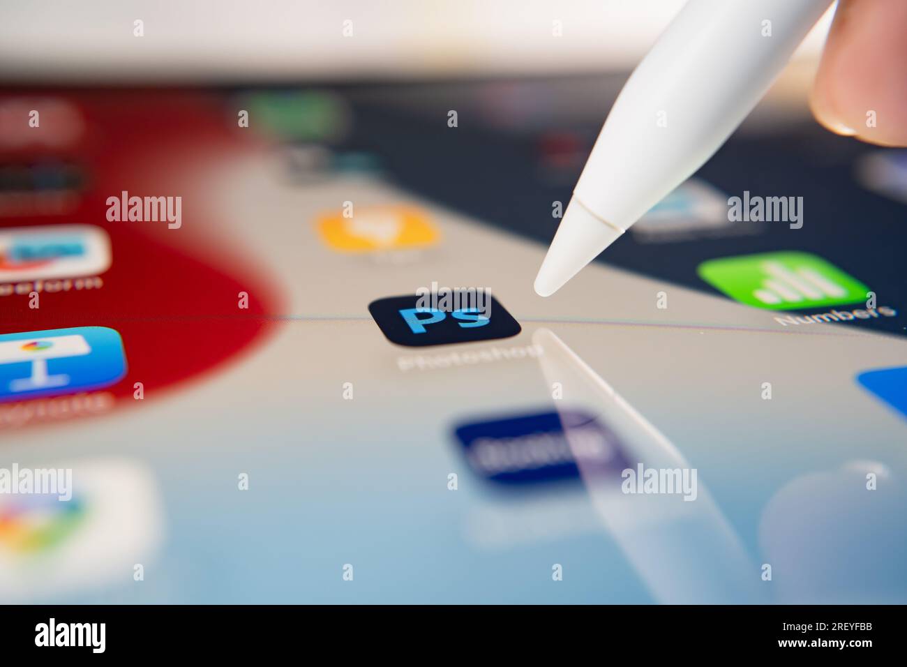 Bangkok, Thailand - July 30, 2023 : iPad user touching on an Adobe ...