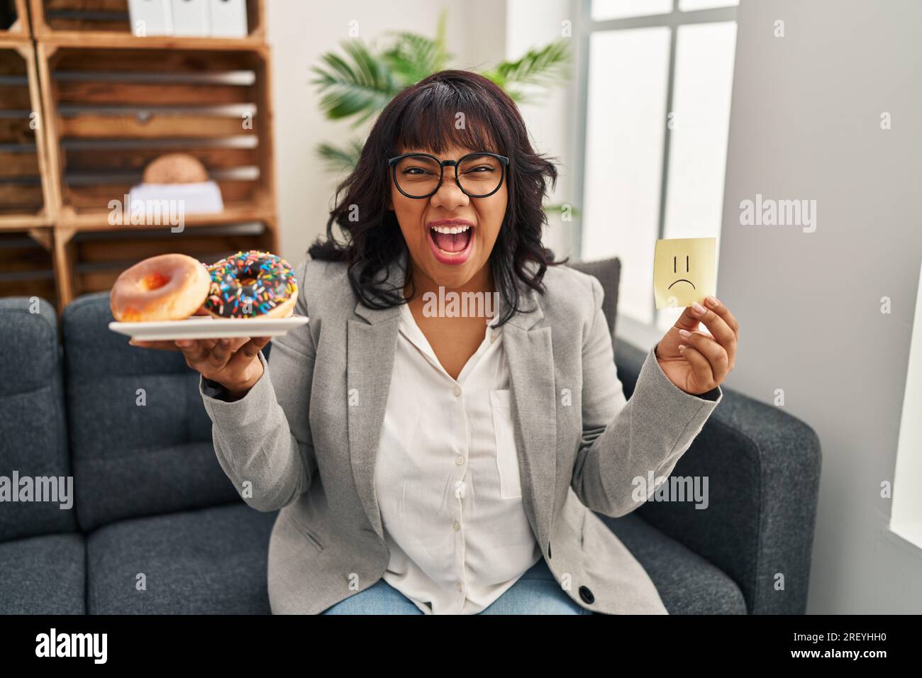 Hispanic therapist woman working on eating disorder angry and mad ...