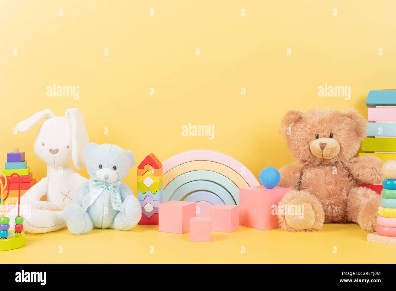 Educational kids toys collection. Teddy bear, wood rainbow, xylophone ...