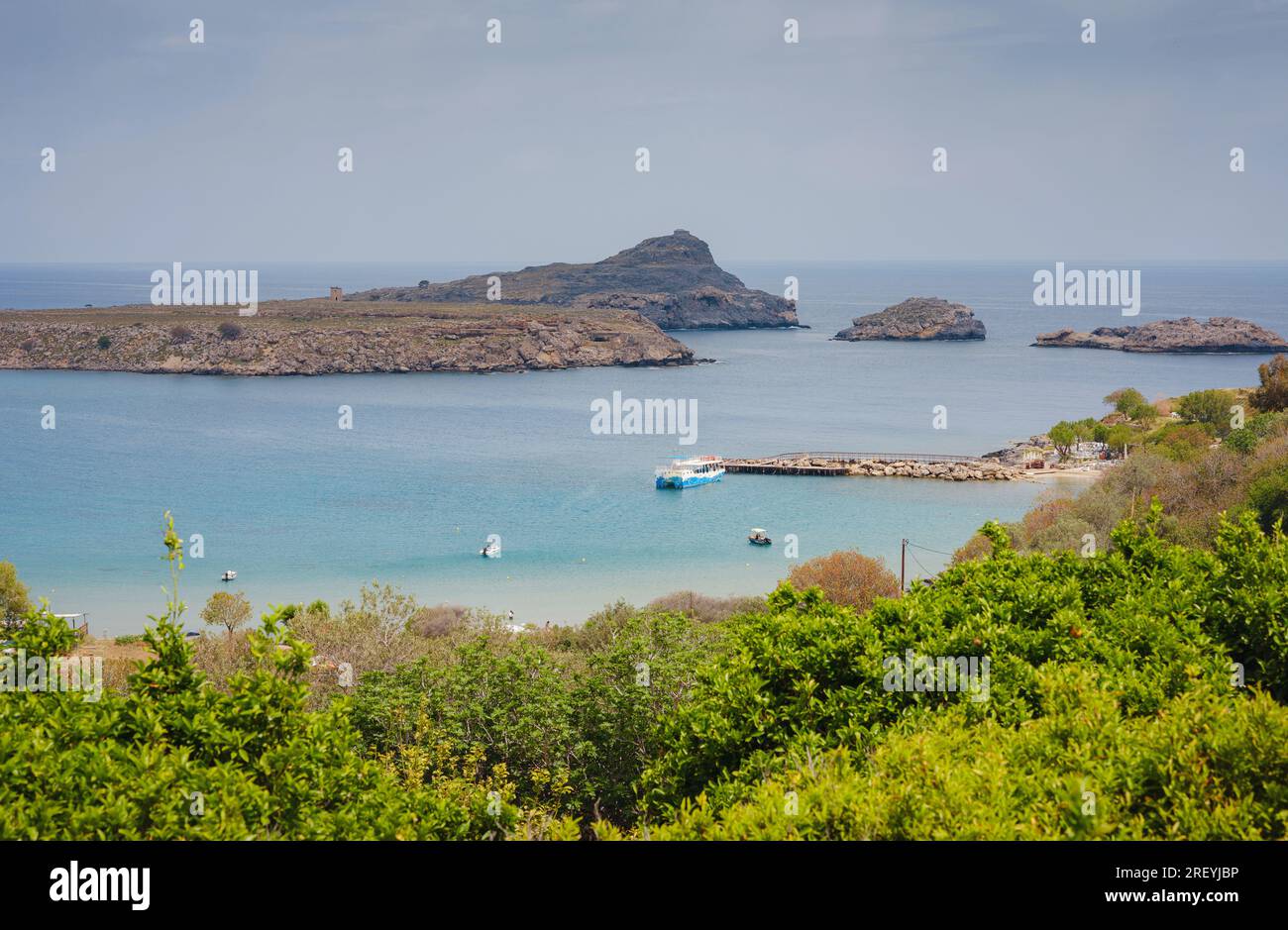 Rhodes, Greece. Lindos small whitewashed village and the Acropolis ...