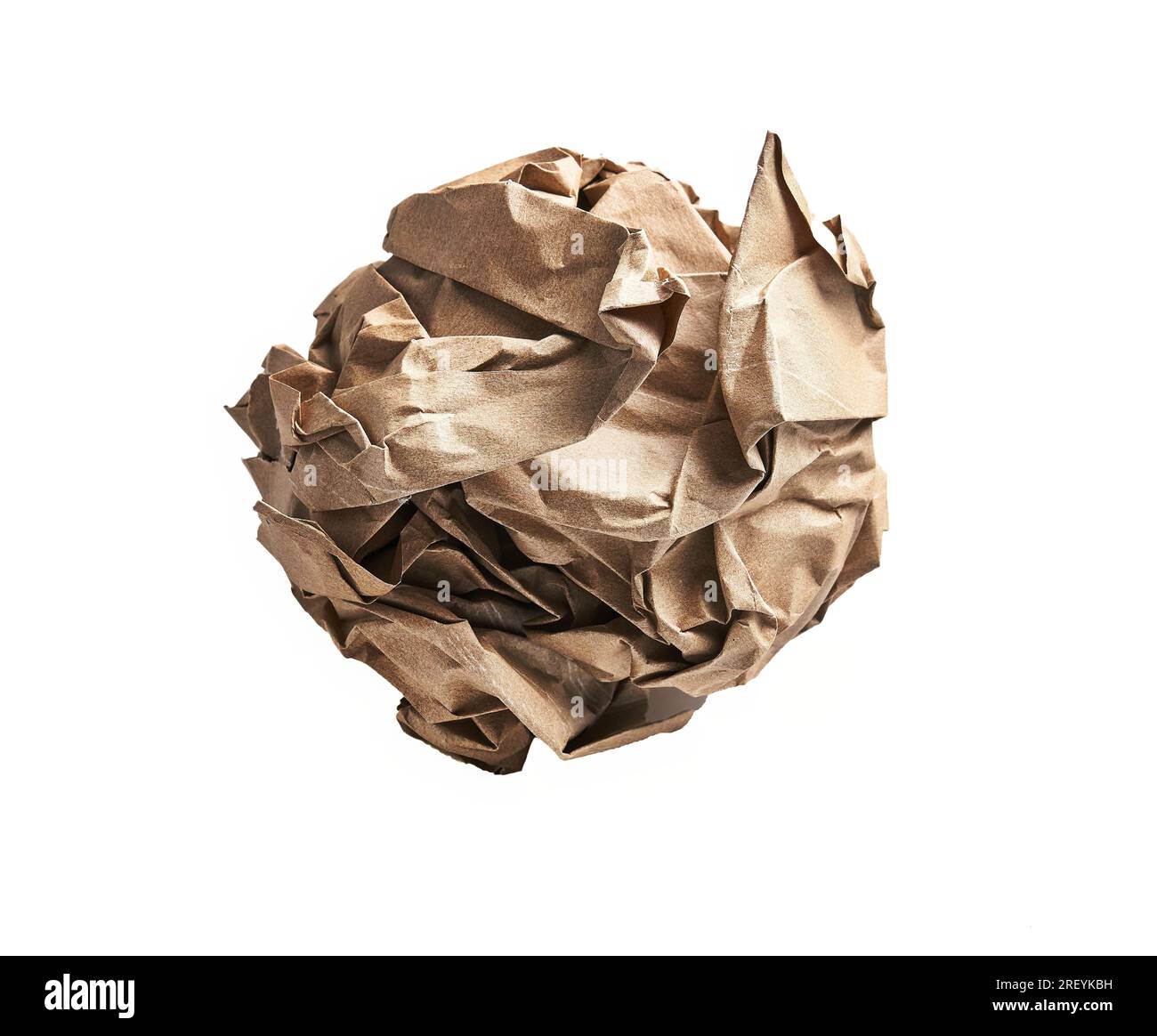 One brown crumpled paper ball over isolated white background Stock ...