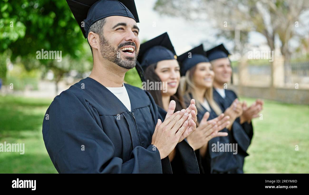 Group of people students graduated clapping applause at university ...