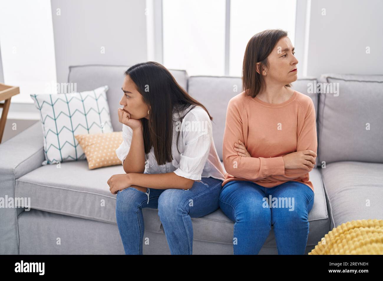 Two women mother and daughter arguing at home Stock Photo - Alamy
