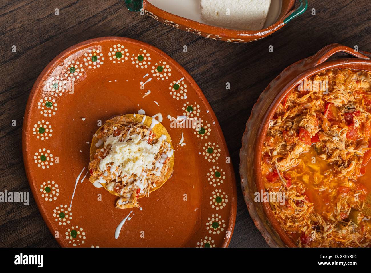 Authentic mexican chicken tinga with fresh cheese and cream on toast ...