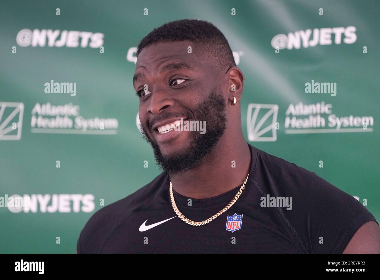 New York Jets' Micheal Clemons talks to reporters after a practice at ...