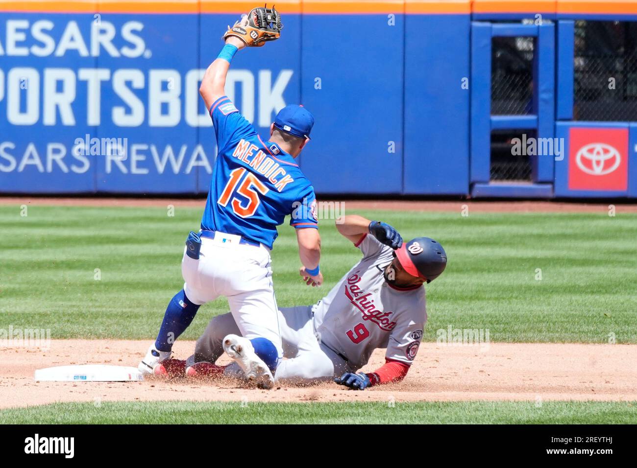 Washington Nationals' Jeimer Candelario (9) steals first base past New ...