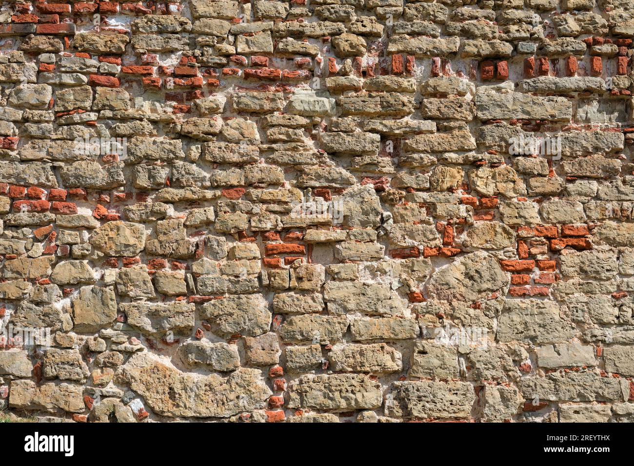 Red ancient stone wall texture hi-res stock photography and images - Alamy