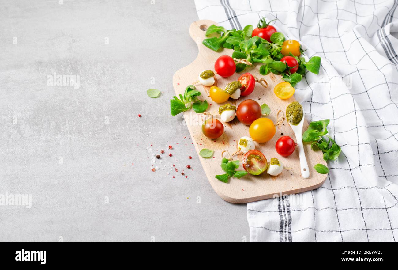 Italian Caprese Canapes Salad With Tomatoes, Mozzarella And Fresh Basil ...