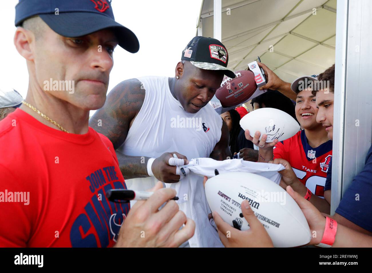 Houston Texans general manager Nick Caserio, left, and offensive tackle ...