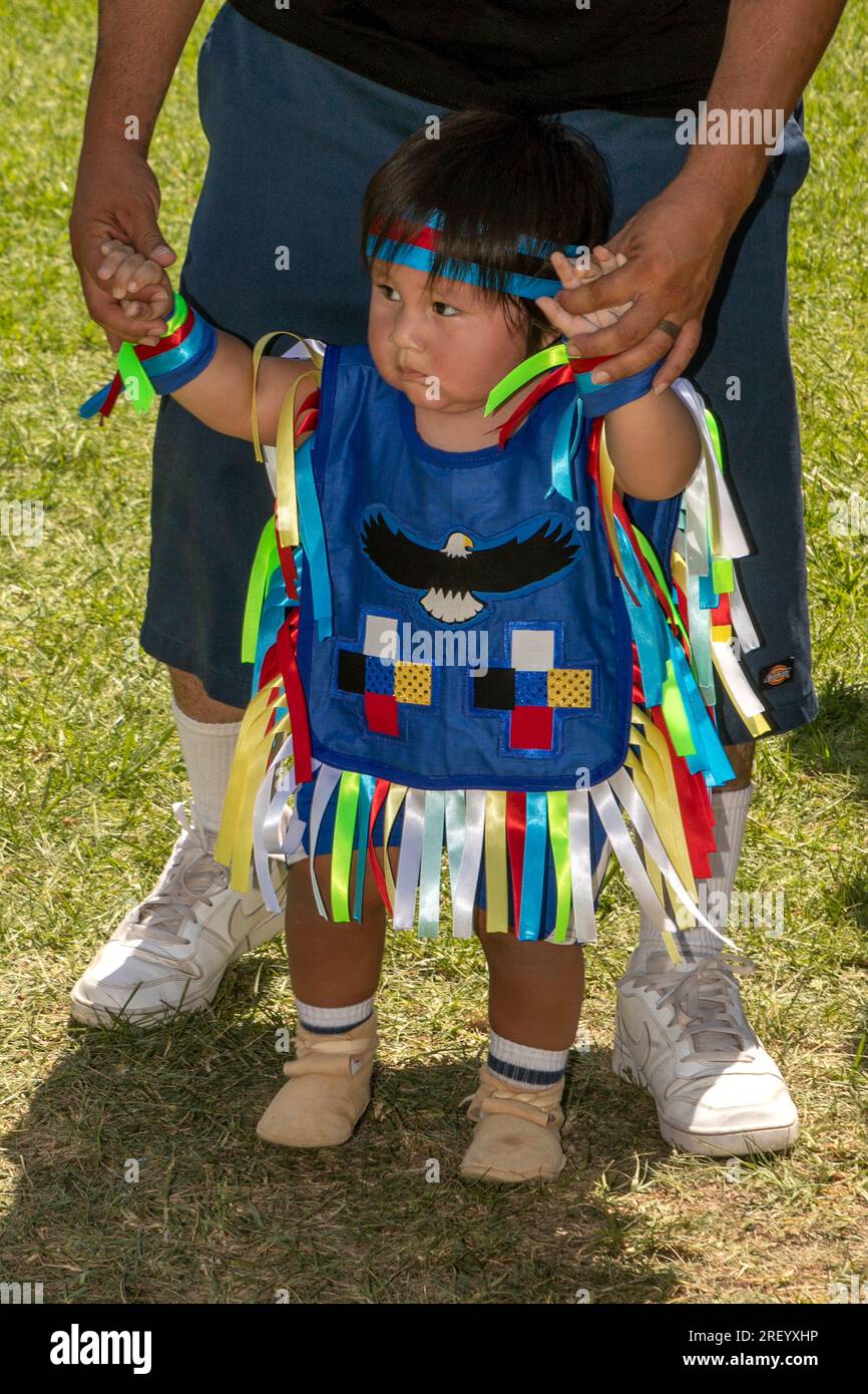 A Native American toddler girl wears the costume of the Acjachemen ...