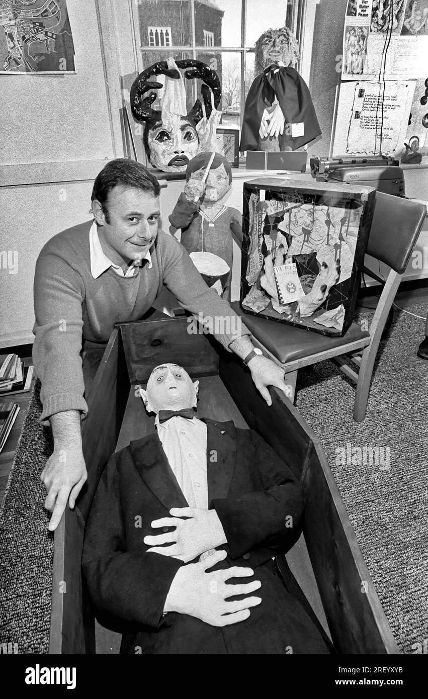 A Tufts University professor with some of his students' class projects ...