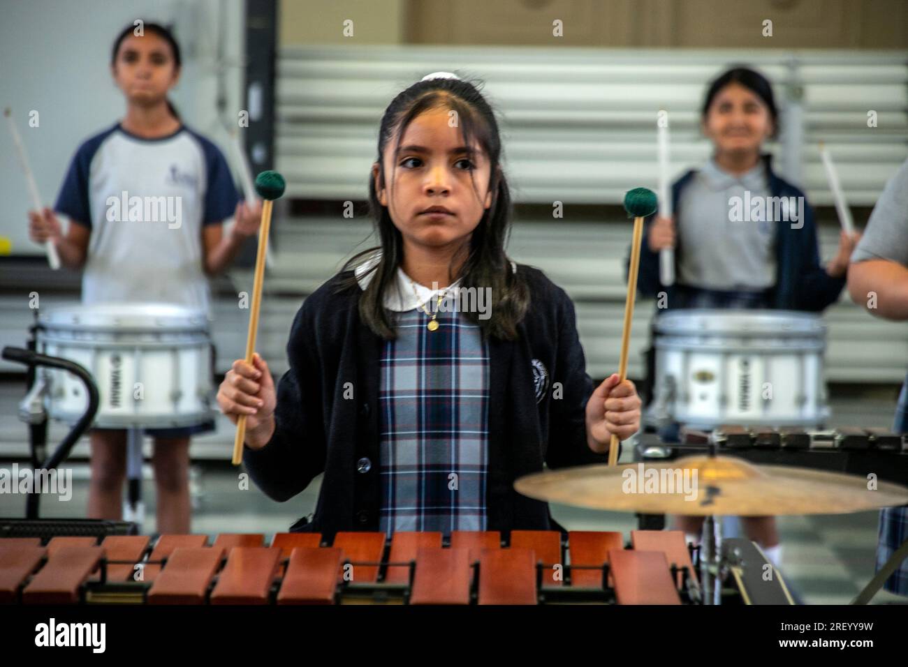 A uniformed student at a Catholic middle school in Santa Ana, CA ...
