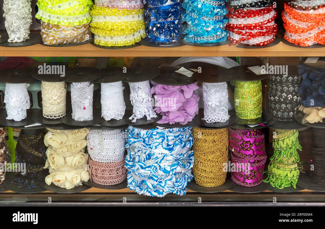 Decorative lace and satin ribbons used for creating clothes sold on ...