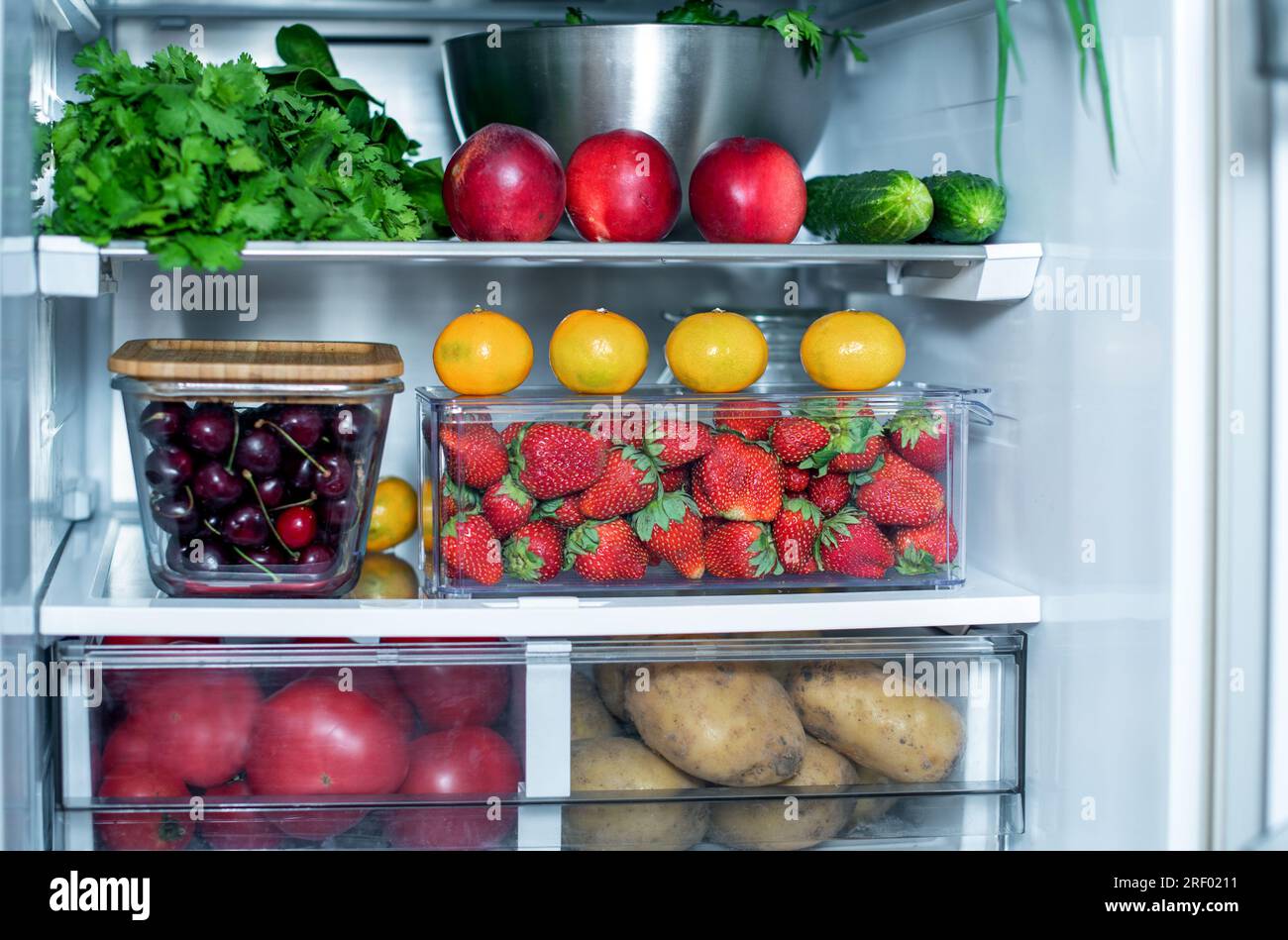 Open fridge full of fresh fruits and vegetables, vegetarian food ...