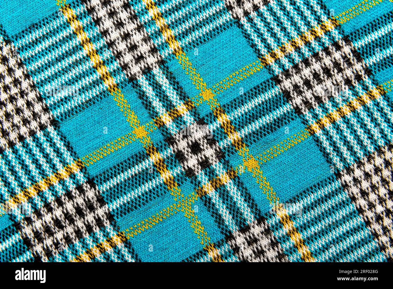 Texture of checkered blue fabric.Textile with intersecting white, black ...