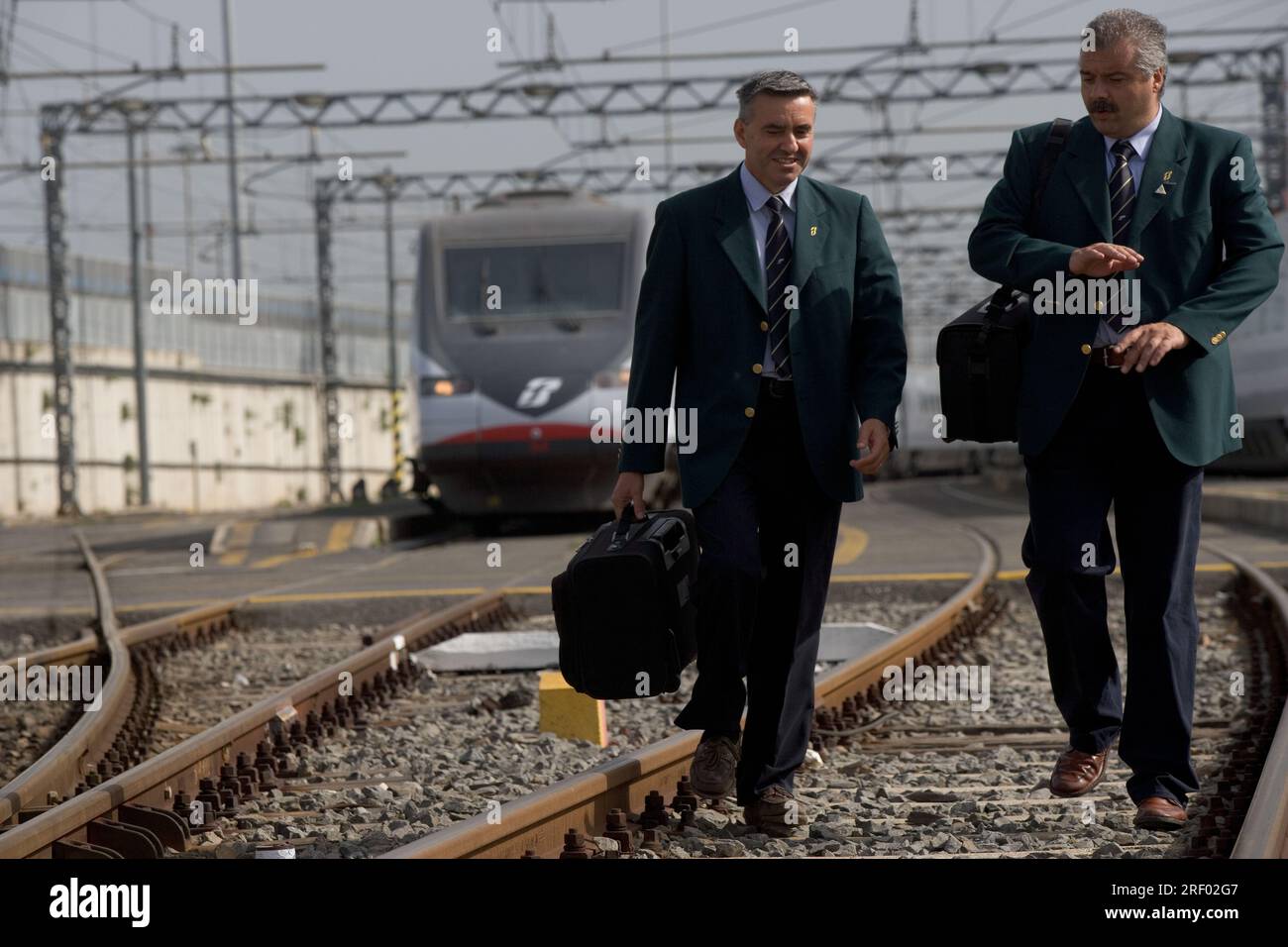 Train drivers coming off duty at Milan railway depot, Trenitalia, the ...