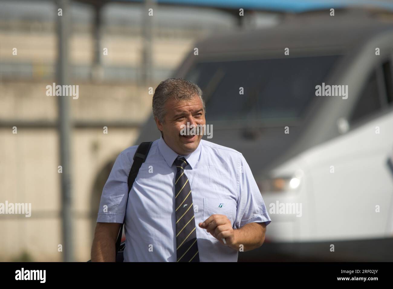 Trenitalia uniform hi-res stock photography and images - Alamy