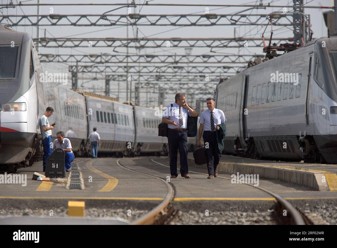 Train drivers coming off duty at Milan railway depot, Trenitalia, the ...