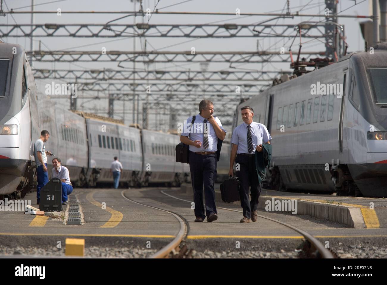 Train drivers coming off duty at Milan railway depot, Trenitalia, the ...