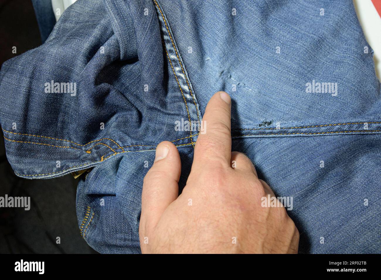 Torn old clothing hi-res stock photography and images - Alamy
