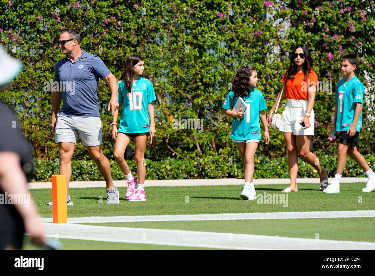 Former Miami Dolphins linebacker Zach Thomas walks on the field with ...