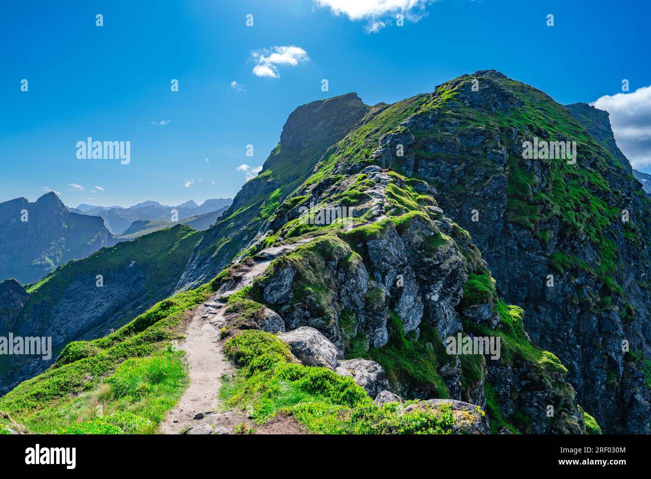 Hiking trail to top of mountain in Reine region, Lofoten islands ...